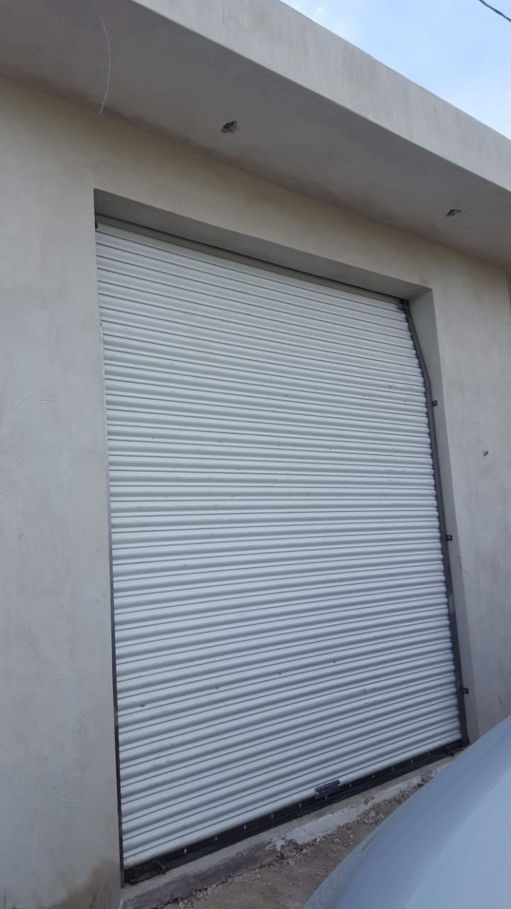 PUERTAS Y CORTINAS - Cortinas y Rampas de Acero